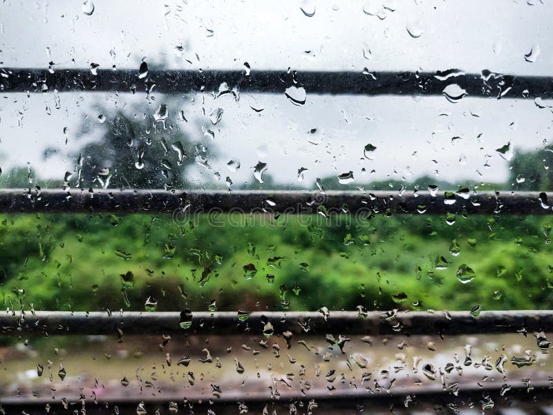 Closeup Image of Water Droplets on the Window of Running Train during ...