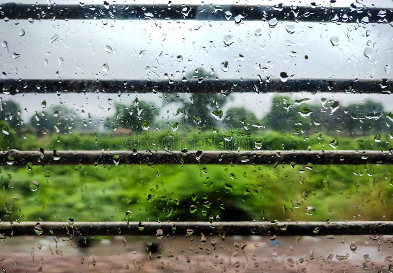 Closeup Image of Water Droplets on the Window of Running Train during ...