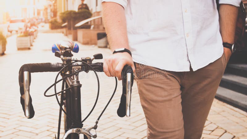 Closeup Image of Young Man Walking with Vintage Bicycle on Street Stock ...