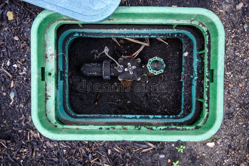 Closeup of Inside of Irrigation System Management Box on a Wet Winter ...