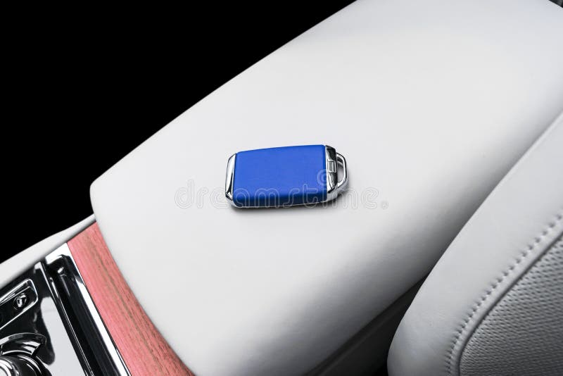 Closeup Inside Vehicle of Wireless Blue Leather Key Ignition on Natural ...