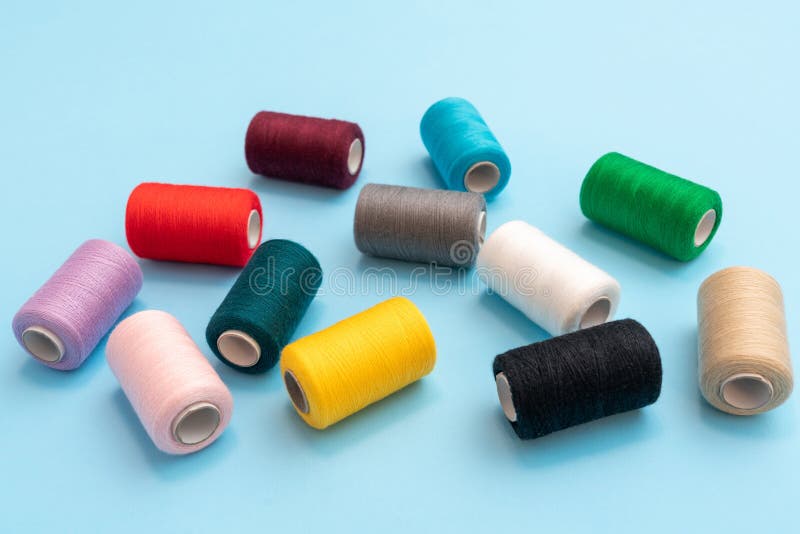Closeup Isometric View of Scattered Colored Spools of Sewing Threads ...
