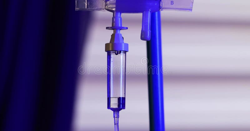 Closeup of IV Drip in Hospital, Intravenous Saline Solution, IV Loading ... Closeup of IV Drip in Hospital, Intravenous Saline Solution, IV Loading ...