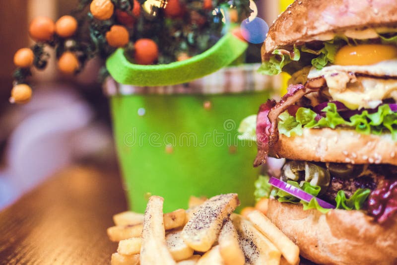 Closeup of a Jumbo Burger Served in a Restaurant Stock Image - Image of ...