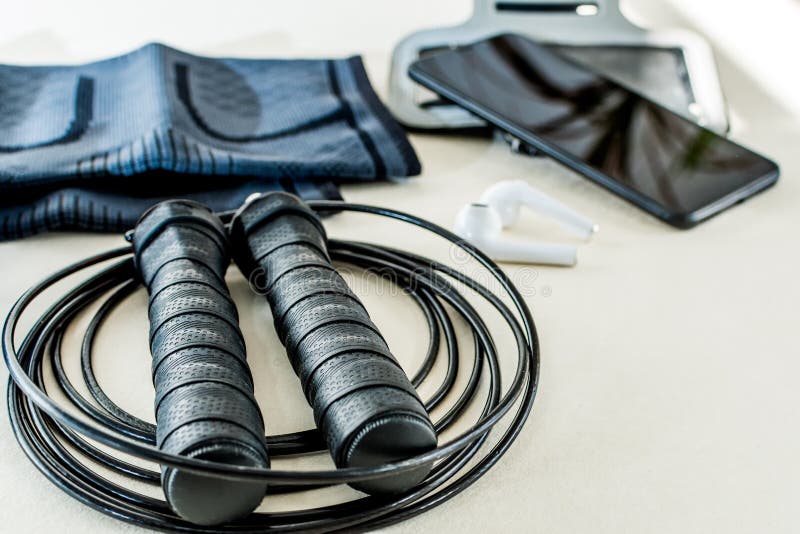 Closeup of a Jump Rope with a Muscle Protector and a Tape Measure on ...