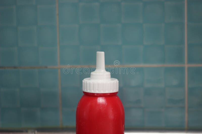 Closeup of Ketchup Bottle Placed on Floor Stock Photo - Image of sealed ...