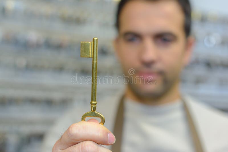 Closeup Key Held by Cobbler Stock Image - Image of young, service: 89031401