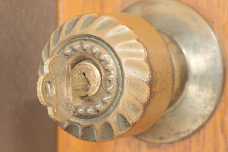 Closeup of Key Inside Keyhole on Doorknob Stock Image - Image of brown ...