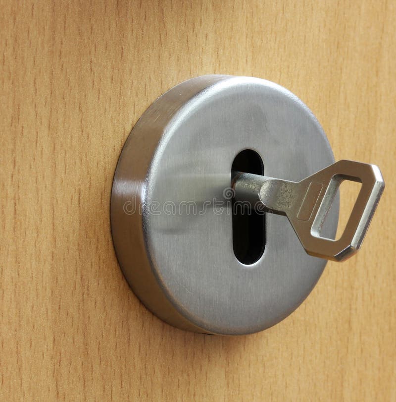 Closeup of an Keyhole with Key on a Wooden Door Stock Photo - Image of ...