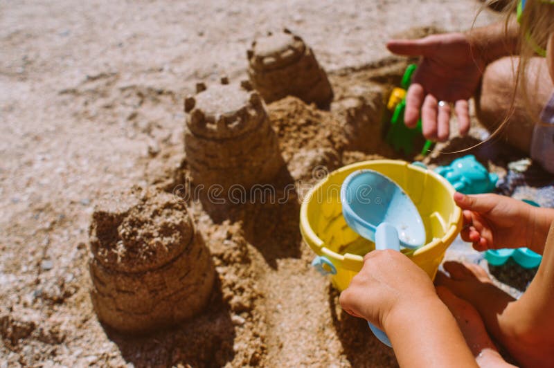 Young Children Making Sand Castle Stock Photo - Image of sand, female ...