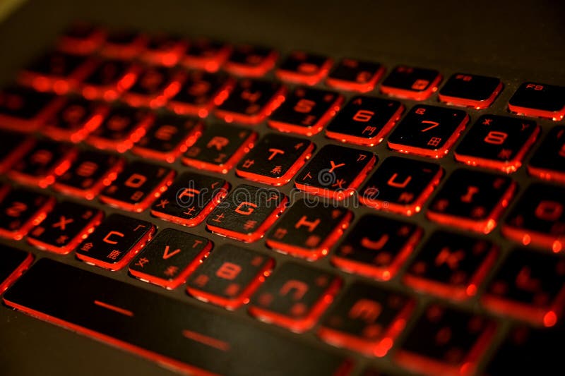 Closeup of Laptop Keyboard Illumination. Red Backlight Keyboard Stock ...