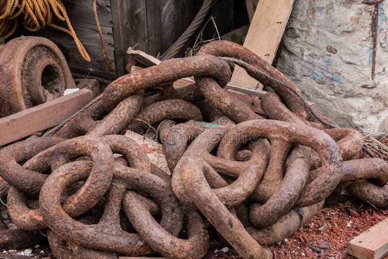 Closeup of Large Rusty Chains Laying on the Ground Stock Photo - Image ...