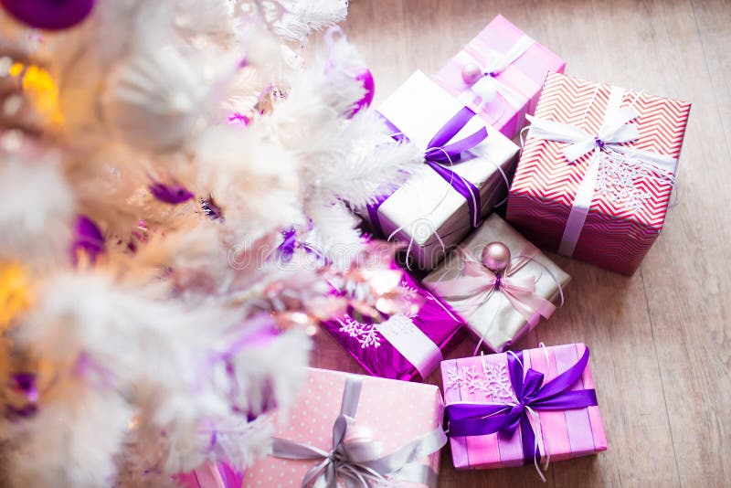 Closeup of a Large Stack of Wrapped Christmas Presents of Varying Sizes ...