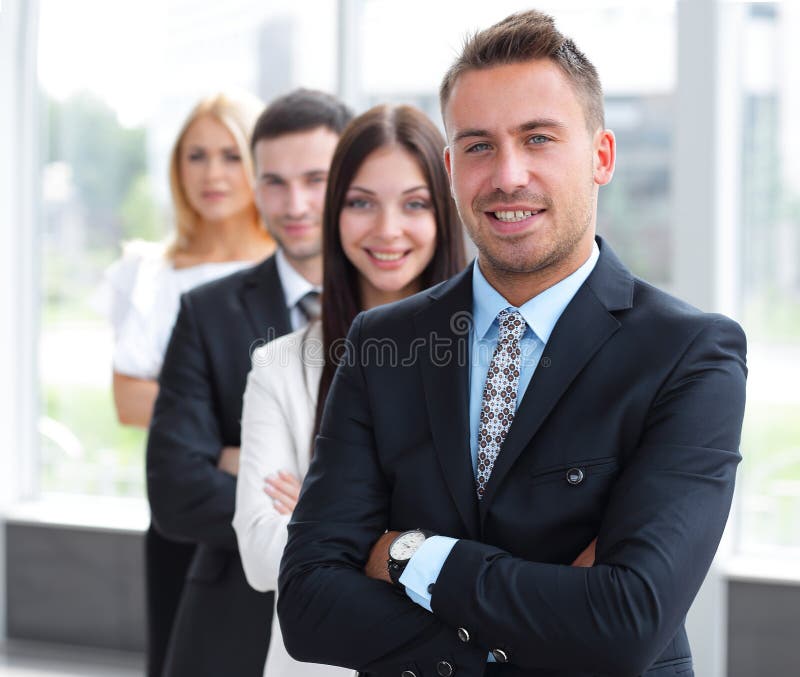 Closeup. Leader Standing in Front of the Business Team Stock Photo ...