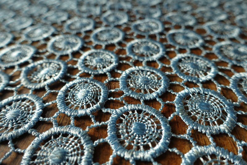 Closeup of Light Blue Crochet Lacy Fabric on Wood Stock Photo - Image ...