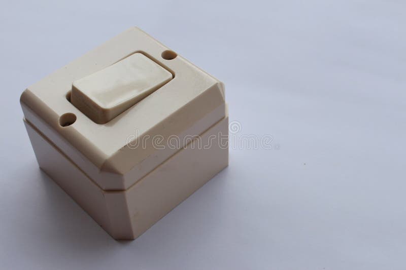 Closeup of a Lighting Switch on White Background with Copy Space. Stock ...