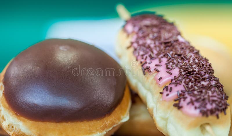 CLOSEUP of LONG DONUTS with CHOCOLATE Stock Photo - Image of doughnut ...