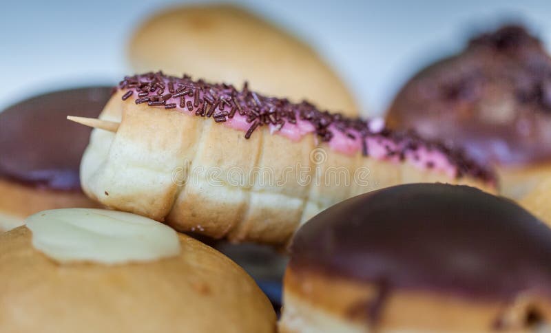 CLOSEUP of LONG DONUTS with CHOCOLATE Stock Image - Image of donut ...