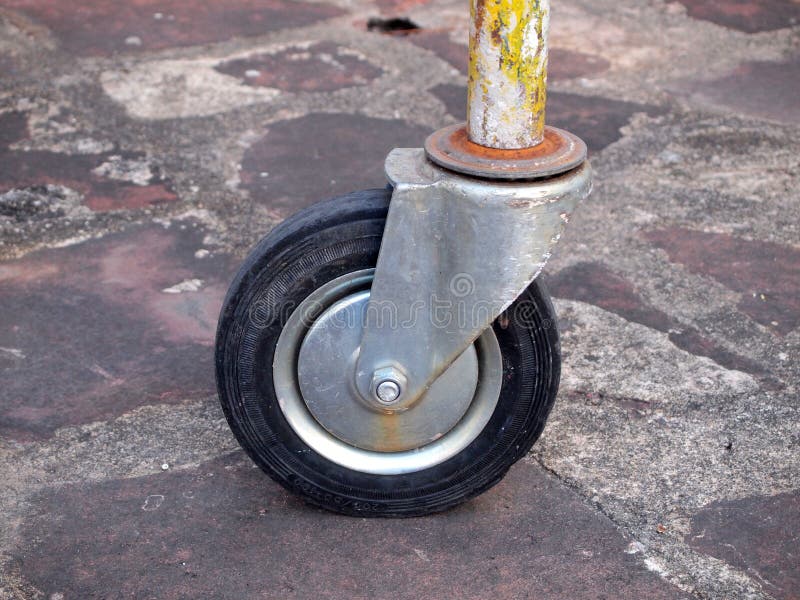 Loose Wheel of Industrial Cart Stock Photo - Image of axis, pivot ...