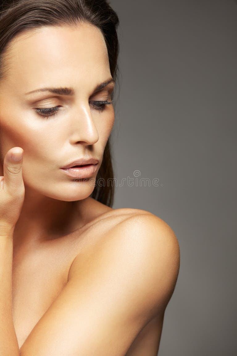 479 Beautiful Woman Touching Her Face Isolated Grey Background Stock