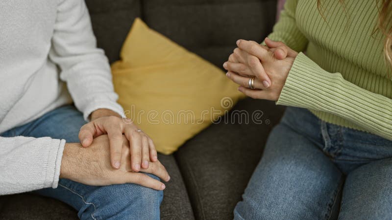 Closeup of a Loving Couple Holding Hands in a Cozy Living Room ...