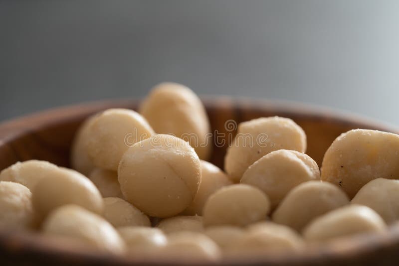 Closeup Macadamia Nuts in Olive Wood Bowl on Terrazzo Surface Stock ...