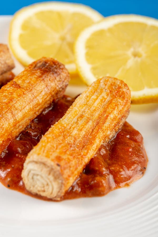 Closeup Macro of Fried Surimi Sticks with Lemons on the Plate Stock ...