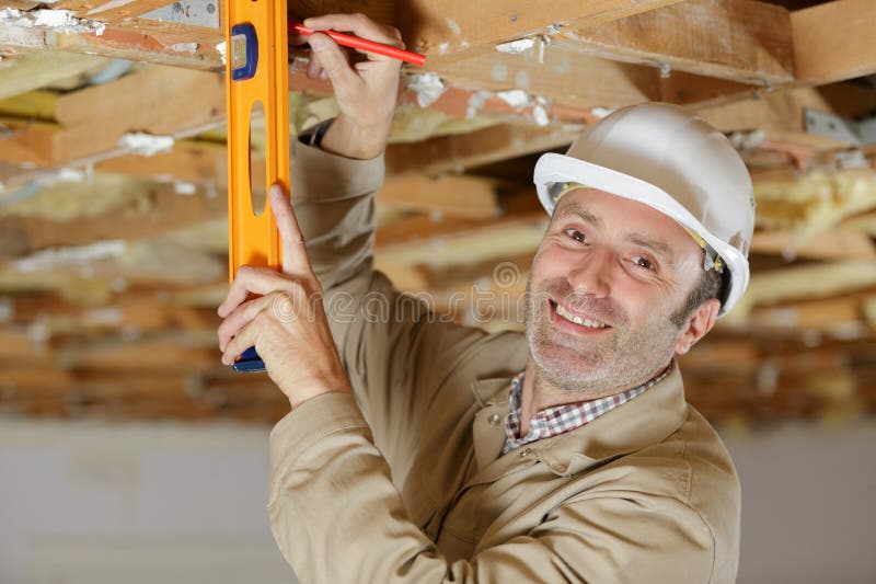 Closeup Male Carpenter Using Level on Wood Structure Stock Image ...