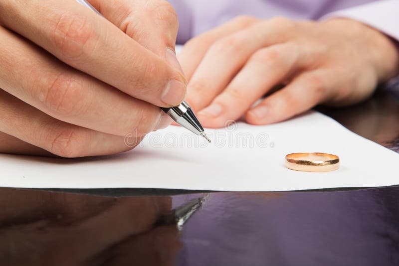 Closeup of Male Hand Signing Divorce Papers Stock Image - Image of ...