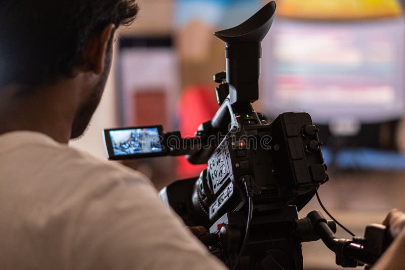 Closeup of Male Holding Camera and Filming during Work Stock Photo ...