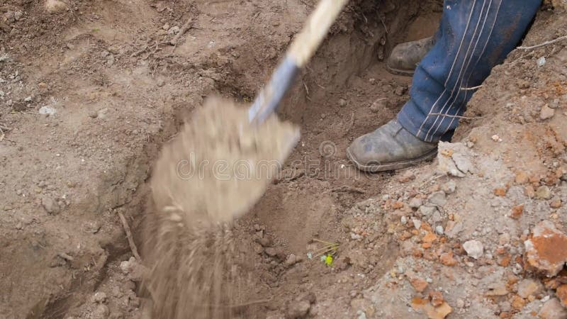 Closeup of Digging a Trench with a Spade in Dry Clay Soil Stock Footage ...