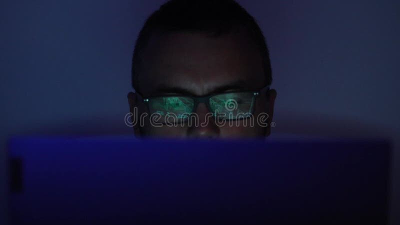 Man Eyes in Eyeglasses Late at Night Scrolling in Front of Laptop with ...