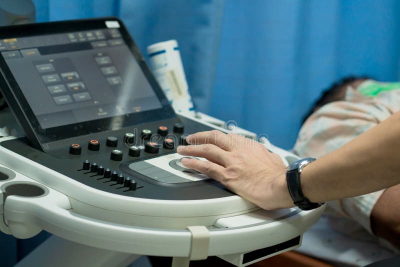 Man Getting an Ultrasound Scan Stock Photo - Image of occupation, lying ...