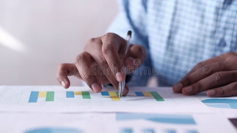 Closeup of Man Hand Analyzing Chart on Paper Stock Footage - Video of ...