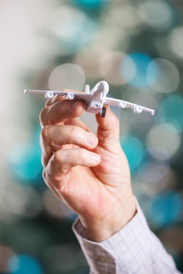 Man Hand Holding Model of Airplane Stock Image - Image of airplane ...