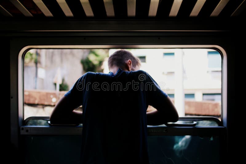 Guy Looking Out Window Train Stock Photos - Free & Royalty-Free Stock ...