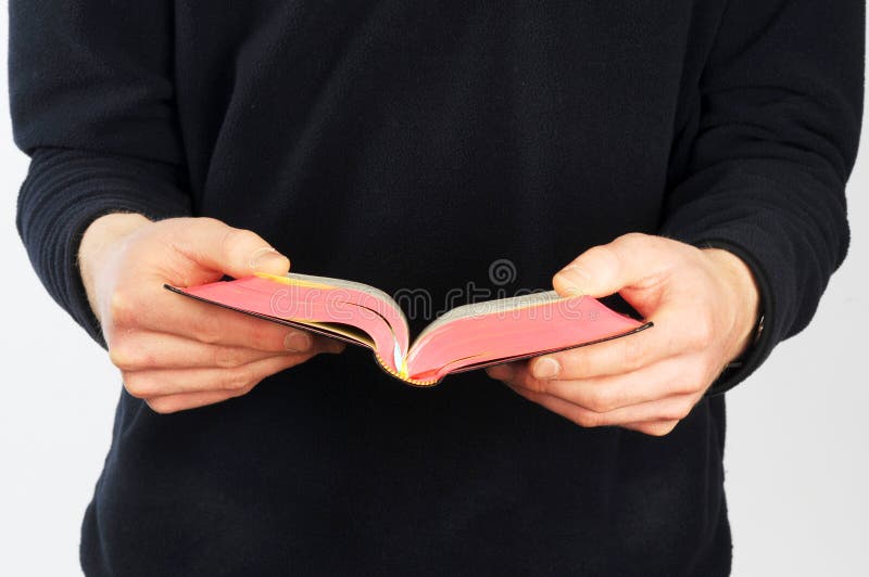 Closeup of Mans Hands Holding Prayer Book Stock Image - Image of ...
