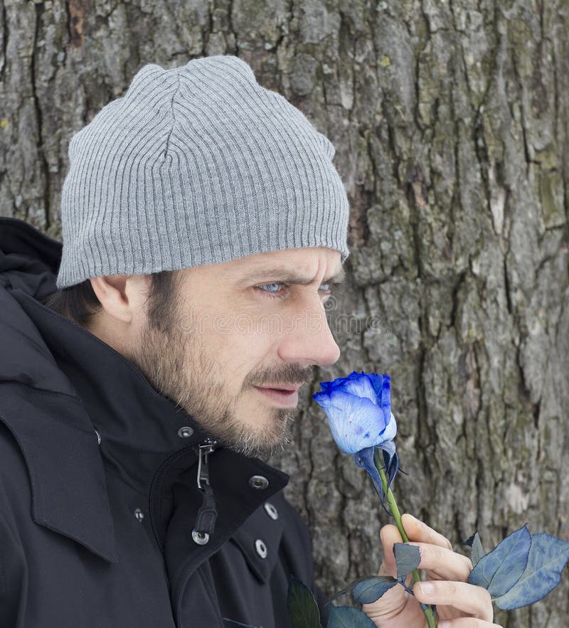 Smelling blue stock image. Image of caucasian, snow, smelling - 29996751