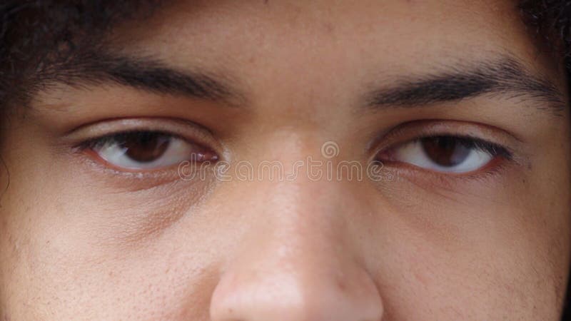 Closeup of a Man Staring and Blinking. Portrait of Guy Testing His ...