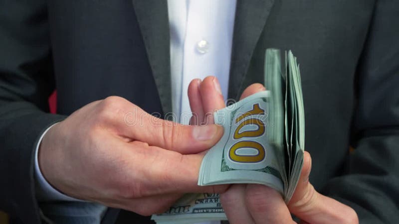 Closeup Man in Suit Showing Stack of Dollars. Successfully Completed ...