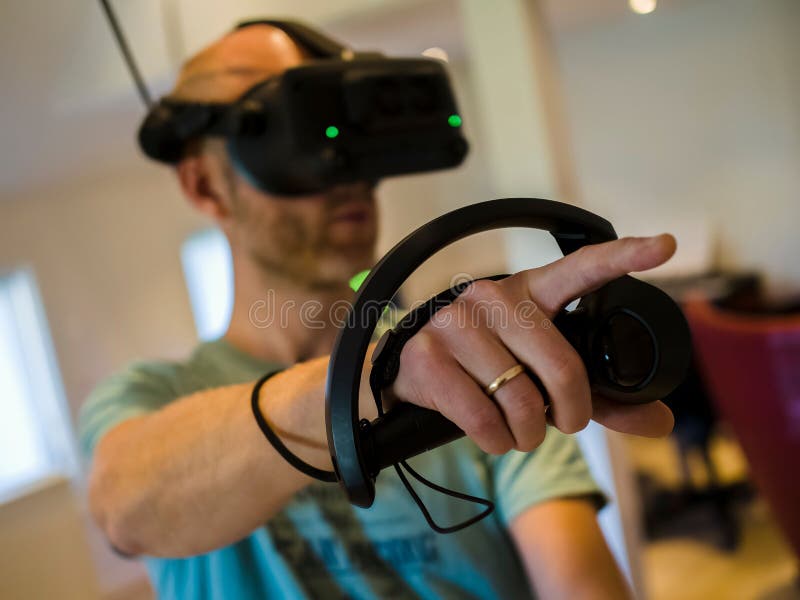 Closeup of the Man with a VR Headset Holding a Game Controller. Stock ...