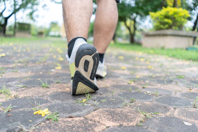 Closeup Man Walking Towards on the Road Side. Stock Image - Image of ...