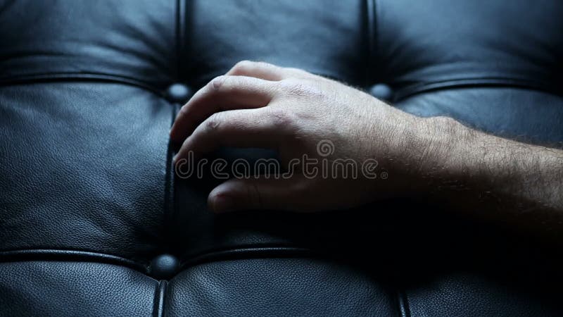 Closeup of Mans Hand Tapping on Black Leather Stock Video - Video of ...