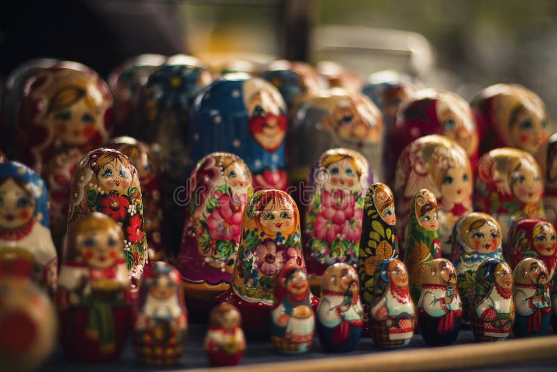 Closeup of Matryoshka Dolls on the Table Under the Lights with a Blurry ...