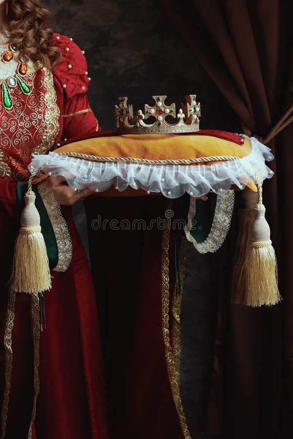 Closeup on Medieval Queen in Red Dress with Crown on Pillow Stock Image ...