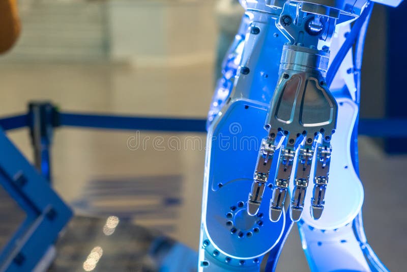Closeup of Metal Robot Hand. Concept of Modern Technology. Blue Tone ...