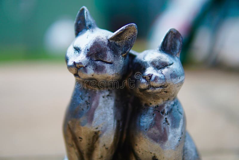 Closeup of a Metallic Statue of Two Cute Cats Stock Image - Image of ...