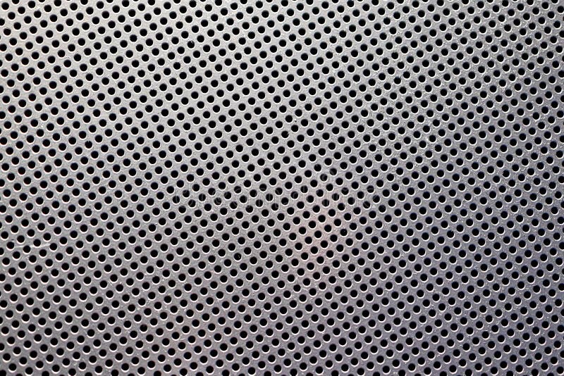 Closeup of a Metallic Surface with Tiny Holes for Textures and Overlays ...