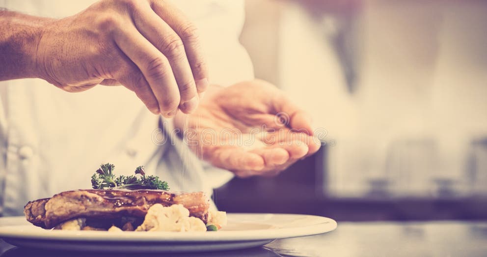 Closeup Mid Section of a Chef Putting Salt Stock Photo - Image of salt ...