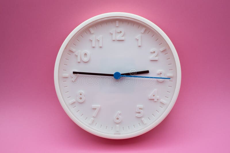 Modern Analog Clock on Pink Background Stock Image - Image of face ...